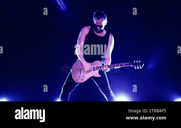 Rock musician, guitarist, showman. Strobe lights, smoke machines ...