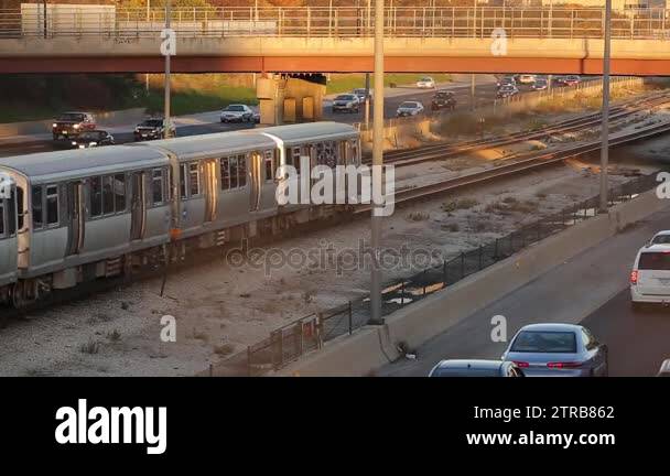 many cars on highways in Chicago congestion along train rides Stock ...