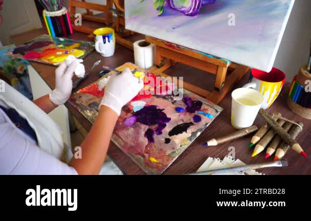 Artist Extrudes Paint From Tubes on Palette For Mixing Colors to Start ...