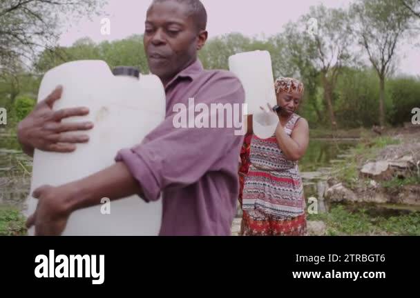 People fill water containers Stock Videos & Footage - HD and 4K Video ...