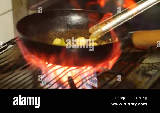Chinese wok pan on fire Stock Videos & Footage - HD and 4K Video Clips ...