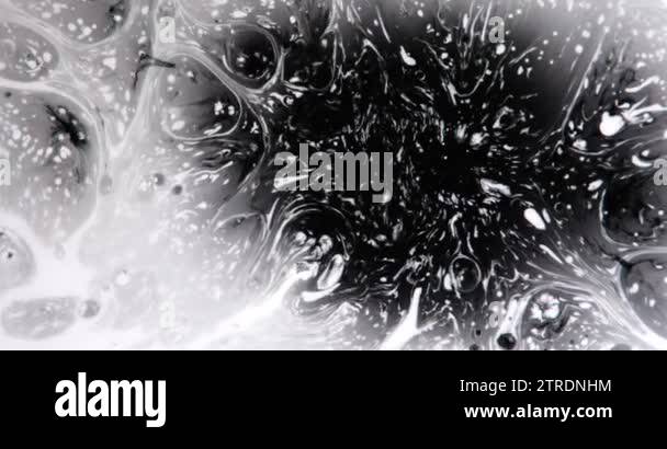 Chemical Environmental Pollution. A drop of black ink on white paper ...