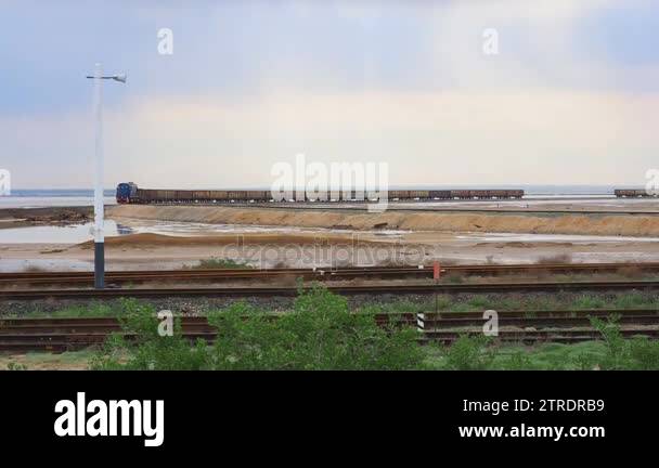 Train with freight wagons trailed carries cargo. The locomotive carries ...