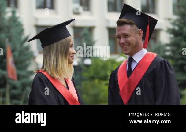 Male female university students talking Stock Videos & Footage - HD and ...