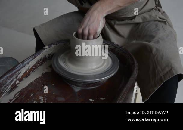 Potter Creates the Product on a Potters Wheel. on the Potters Lathe ...