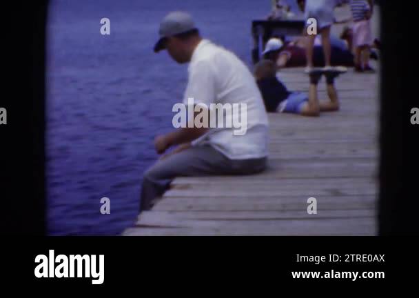 Man sitting on pier Stock Videos & Footage - HD and 4K Video Clips - Alamy