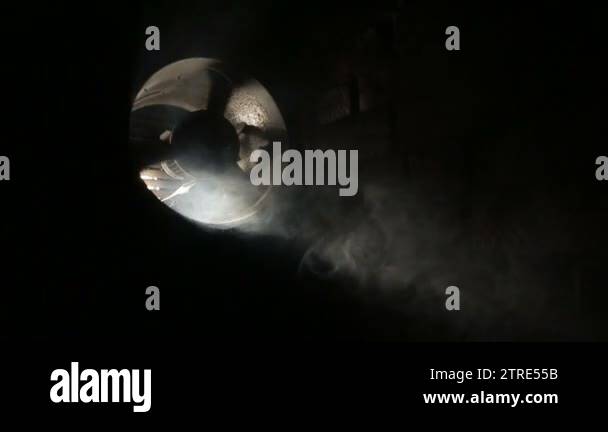 Slow rotating ventilation fan in smoke, Fan Stock Video Footage - Alamy
