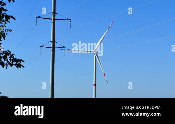 Wind power station. Wind turbine in operation. Green alternative energy ...