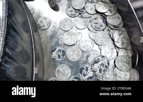 Process of production of coins, 25 cents. Industrial concept. Factory ...