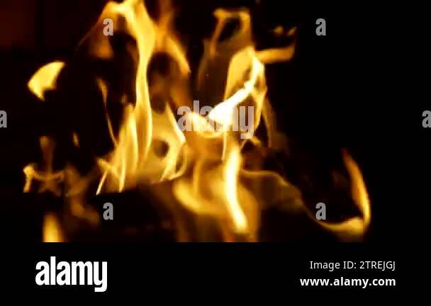 Igniting fire isolated on black background Stock Video Footage - Alamy