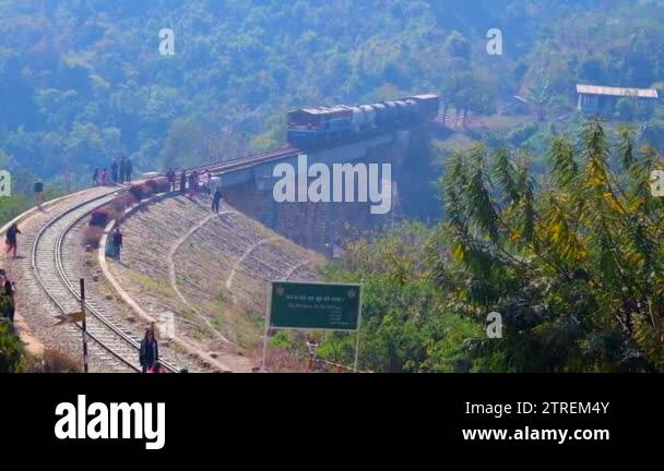 HEHO, MYANMAR - FEBRUARY 19, 2018: The old train rides along the old arch Bawa Than Tha Yar ...