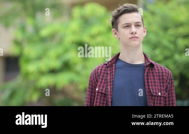 Teen boy thinking outdoors Stock Videos & Footage - HD and 4K Video ...