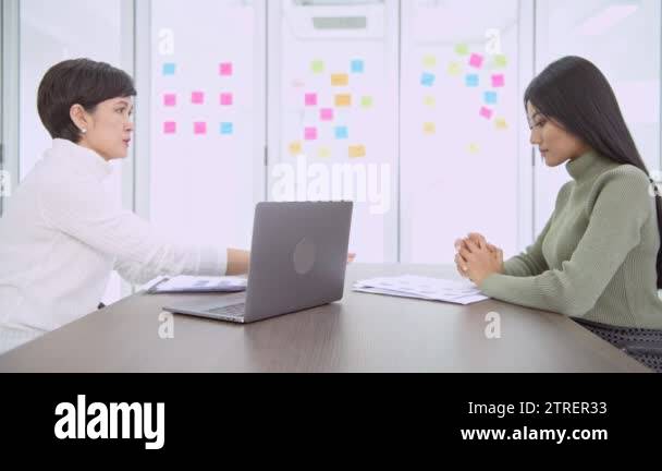 Angry boss. Angry indian woman shouting at his asian woman employee in ...