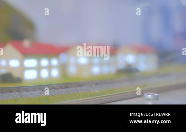 Toy hobby railroad layout with train and houses Stock Video Footage - Alamy