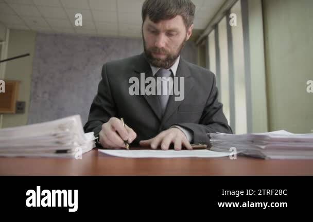 Office worker signing documents Stock Videos & Footage - HD and 4K ...
