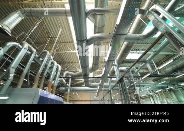 Industrial factory ceiling with ventilation system and lights ...