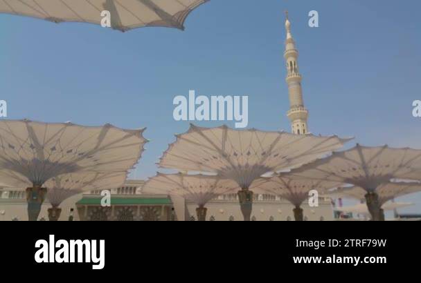 Muslims walking outside haram Masjid (mosque) Nabawi in Al Madinah ...