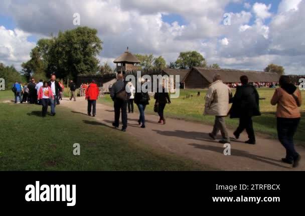 People visit replica of the Iron age fortified settlement in Biskupin ...