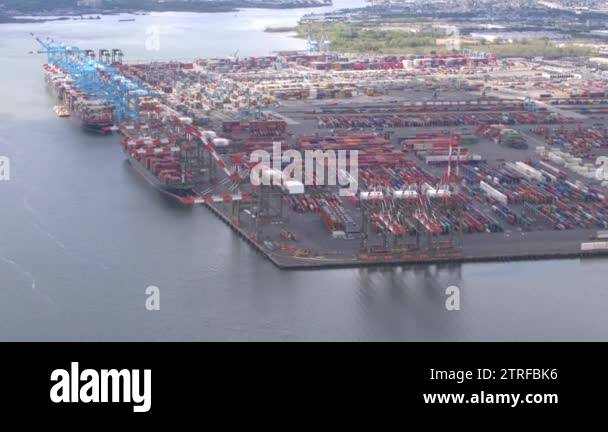 AERIAL: Colorful freight containers in large trade and transportation ...