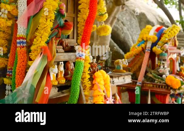 Wooden miniature guardian spirit house. Small buddhist temple shrine ...