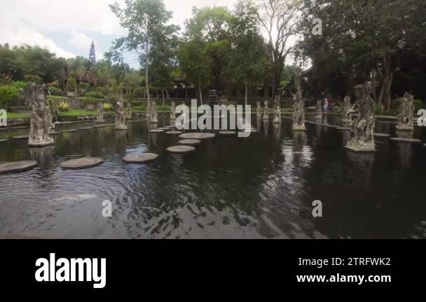 Hindu Balinese Water Palace Tirta Gangga with statues of the gods ...