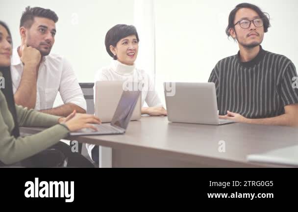 Business meeting. Small start up business meeting in room. Asian team ...