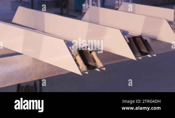 Hands of worker using a silicone tube for repairing of window indoor ...