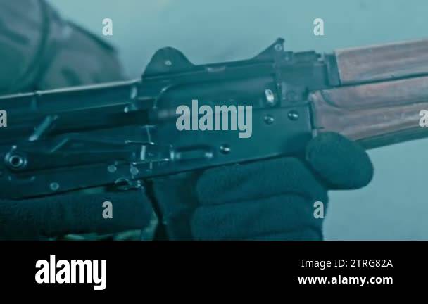 Soldier hand charging kalashnikov rifle. Assault rifle kalashnikov ...