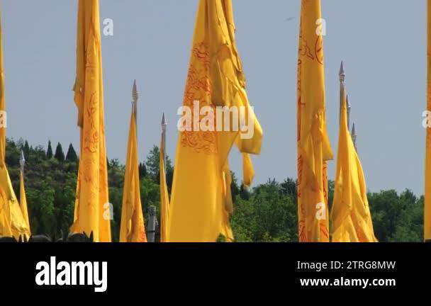 Yellow flags wave at the entrance to the Qin Shi Huang tomb in Xian ...