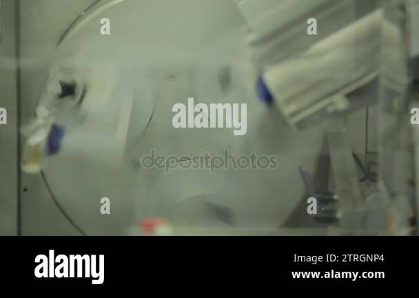 interior of a pharmaceutical industry equipment for packing pills boxes ...