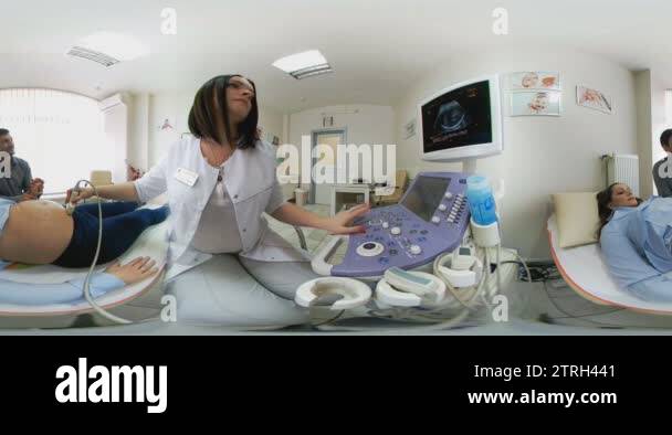vr 360 panorama Husband looking at ultrasound scan his pregnant woman ...