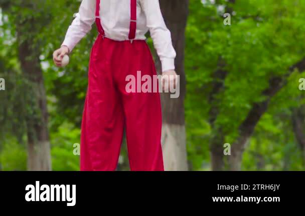 Clown mime on stilts Stock Videos & Footage - HD and 4K Video Clips - Alamy
