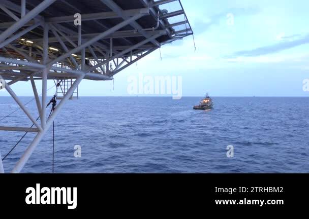 Supply boat pulling the rig while rig move to another location Stock ...