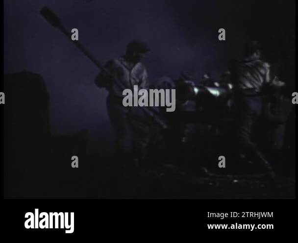 Historical reenactment of soldiers loading cannon during Civil War ...