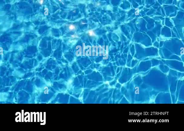 Amazing swimming pool shimmering with its bright see-through sky blue ...