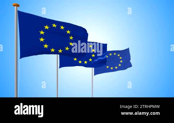 Three flags of the European Union develops in the wind on a blue ...
