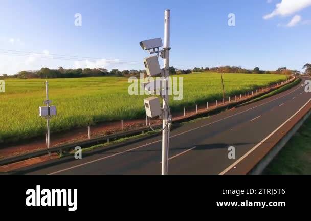 Traffic radar with speed enforcement camera in a highway. Automatic ...