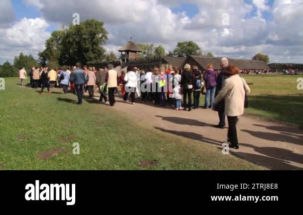 People visit replica of the Iron age fortified settlement in Biskupin ...