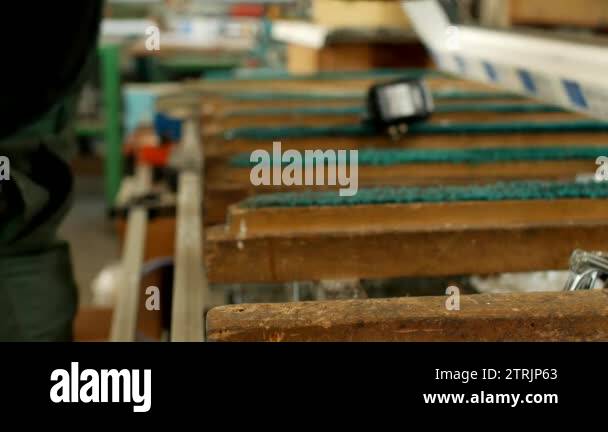 Production and manufacturing of pvc windows, male worker produces pvc ...
