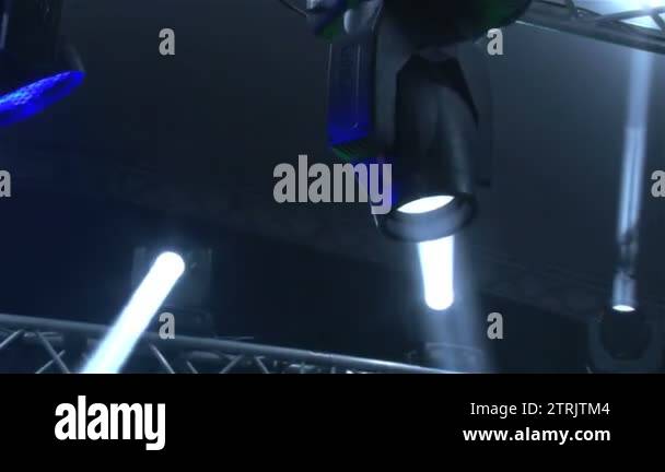 Stage lights at the concert with fog, Stage lights on a console ...