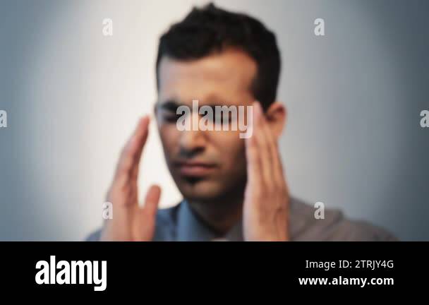 Rubbing temples Stock Videos & Footage - HD and 4K Video Clips - Alamy