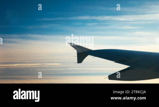 Plane flying to right - Beautiful aerial point of view of passenger ...