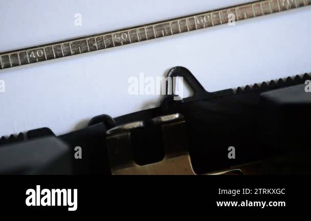 Typing the expression First and Foremost with an old manual typewriter ...