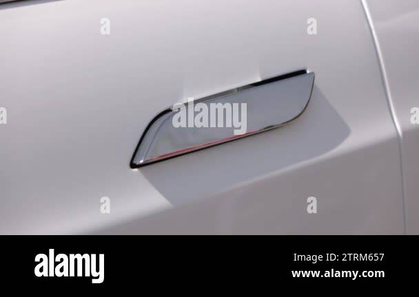 CLOSE UP: Tesla eco electric car door opening system and handle coming ...