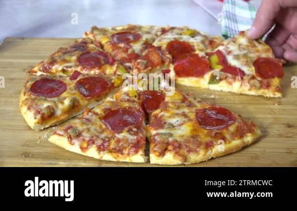 A slice of pepperoni pizza Stock Videos & Footage - HD and 4K Video ...