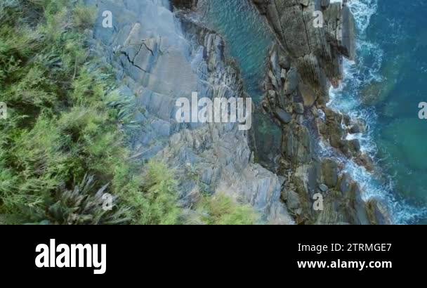 aerial overhead view of ocean mediterranean sea waves reaching and ...