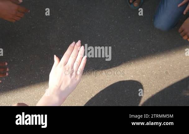 Arm of all races and colors stacked together one by one in unity and ...