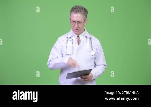 Portrait mature doctor clipboard Stock Videos & Footage - HD and 4K ...