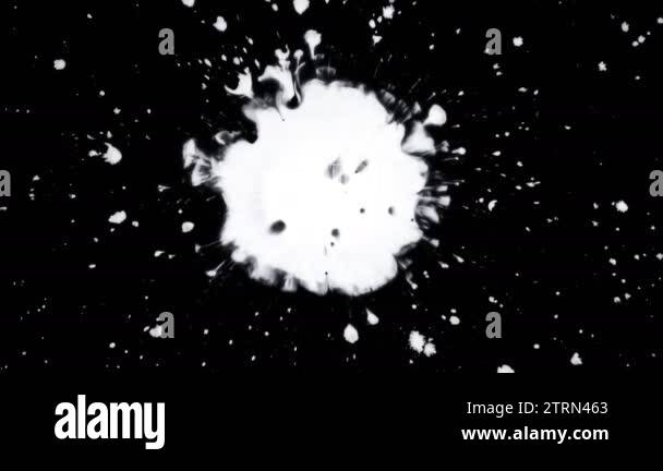 Beautiful white watercolor ink drops on black background, paint bleed ...