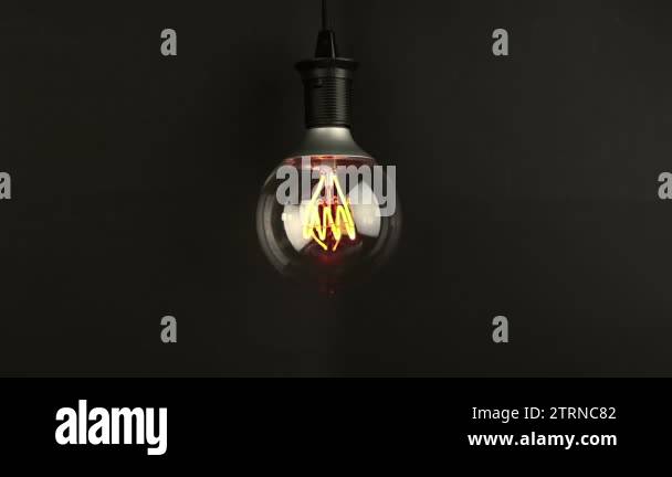 turn on and turn off, with blinking effect, retro vintage light bulb ...